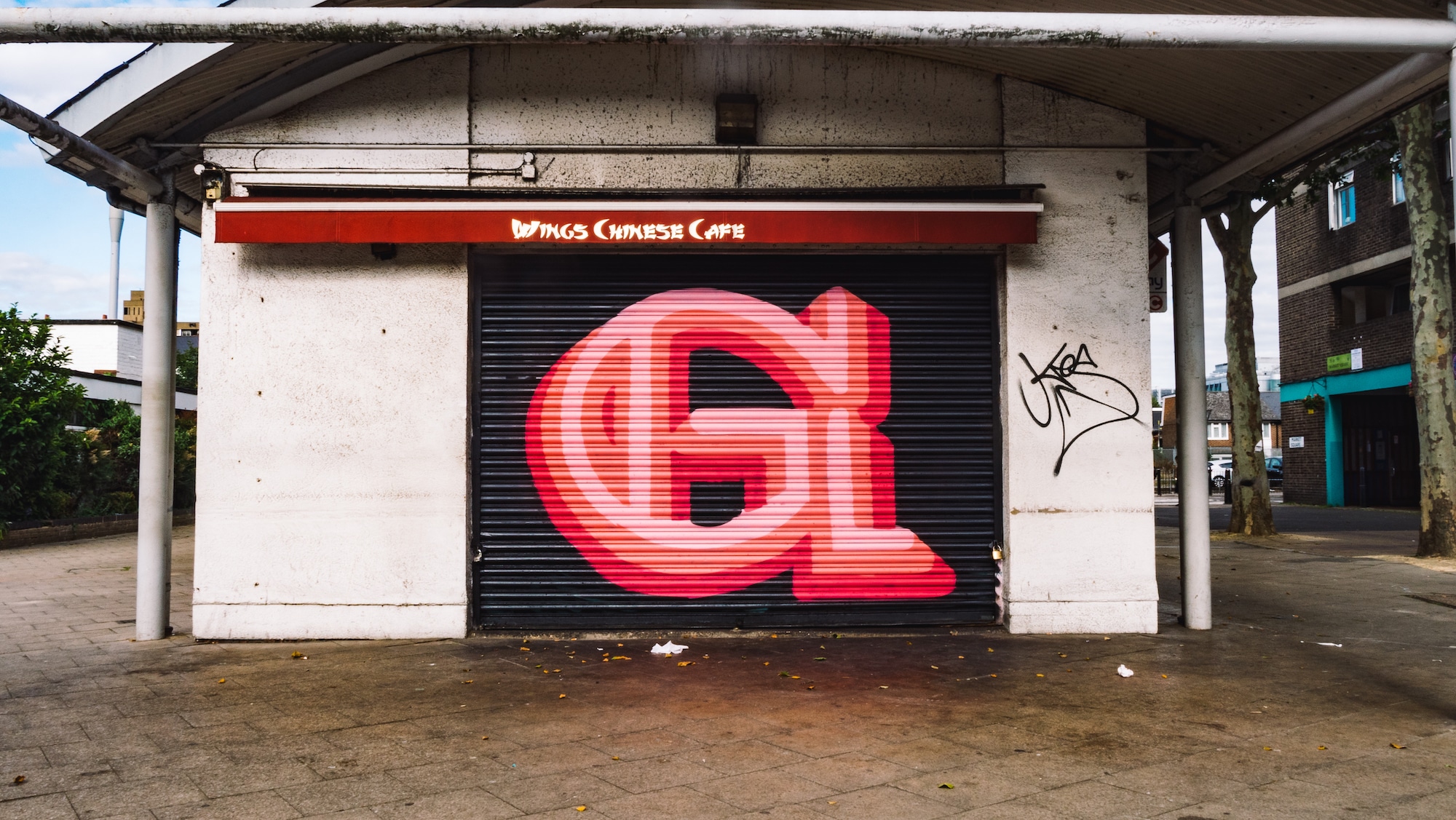 The Full English Alphabet Painted on Store Shutters in 26 Different ...