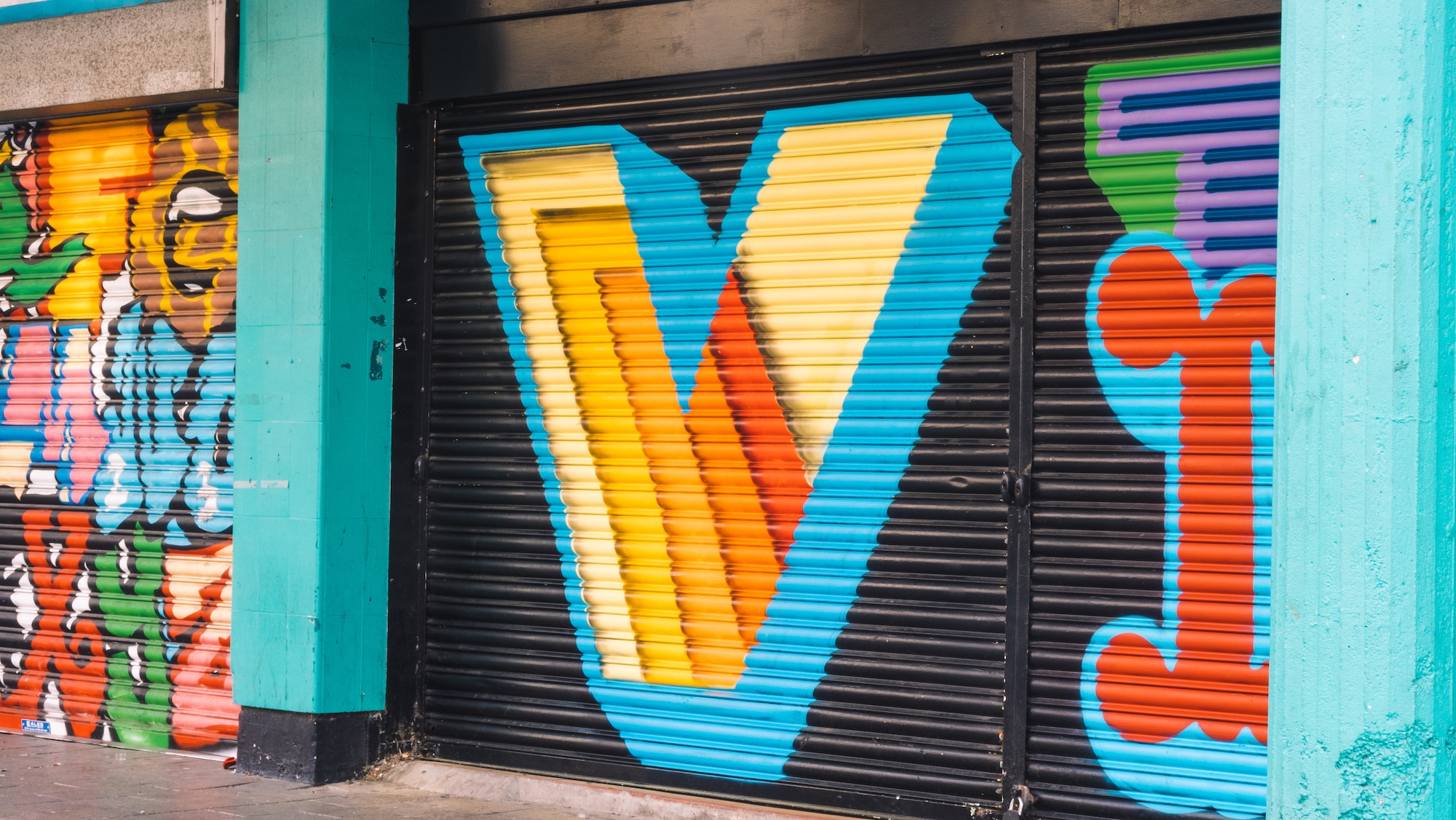 The Full English Alphabet Painted on Store Shutters in 26 Different ...