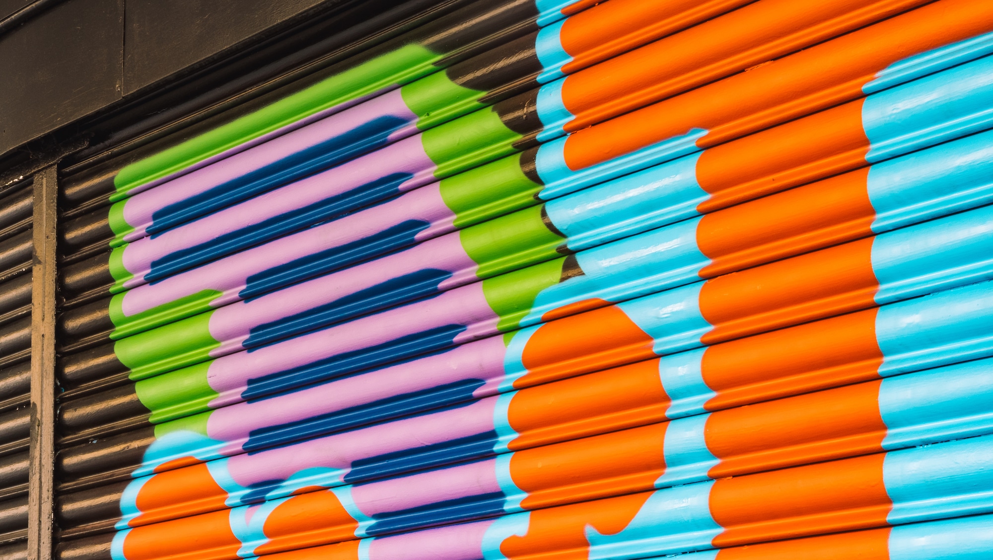 The Full English Alphabet Painted on Store Shutters in 26 Different ...